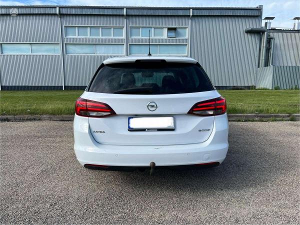 White Opel Astra 2016 in Taurage, with an engine capacity of 1.00 L and mileage of 188 thousand km for 4900 €, photo 6 on AUTOMOTO.COM.LV