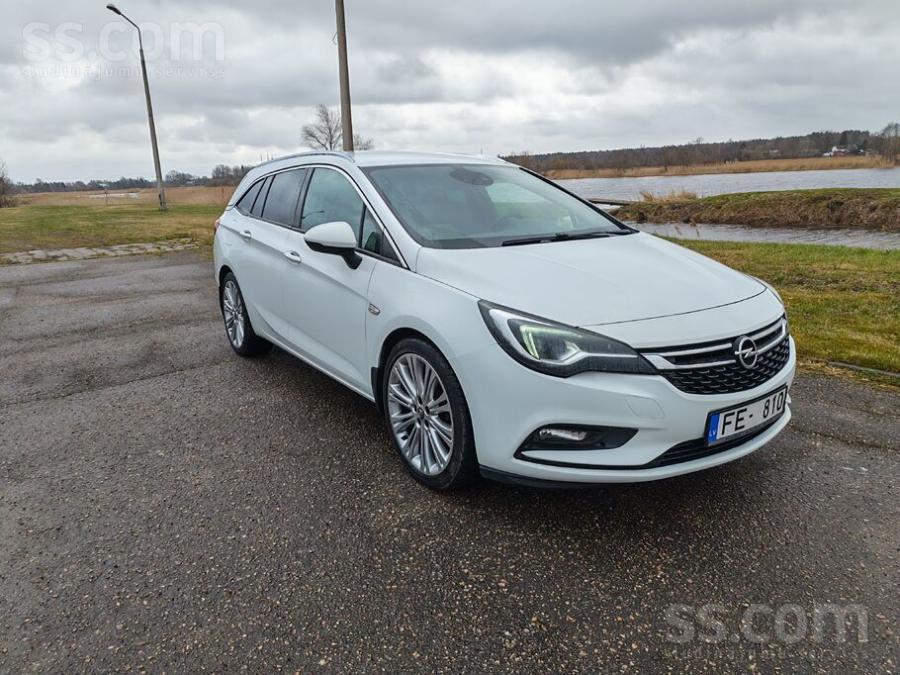 White Opel Astra 2016 in Riga, with an engine capacity of 1.60 L and mileage of 290 thousand km for 4950 €, photo 3 on AUTOMOTO.COM.LV