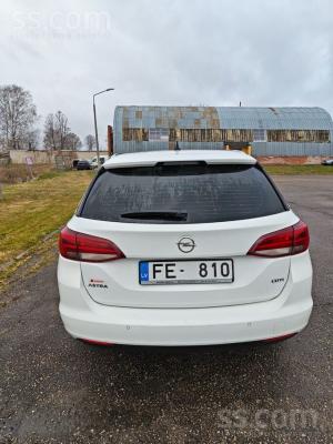 White Opel Astra 2016 in Riga, with an engine capacity of 1.60 L and mileage of 290 thousand km for 4950 €, photo 7 on AUTOMOTO.COM.LV