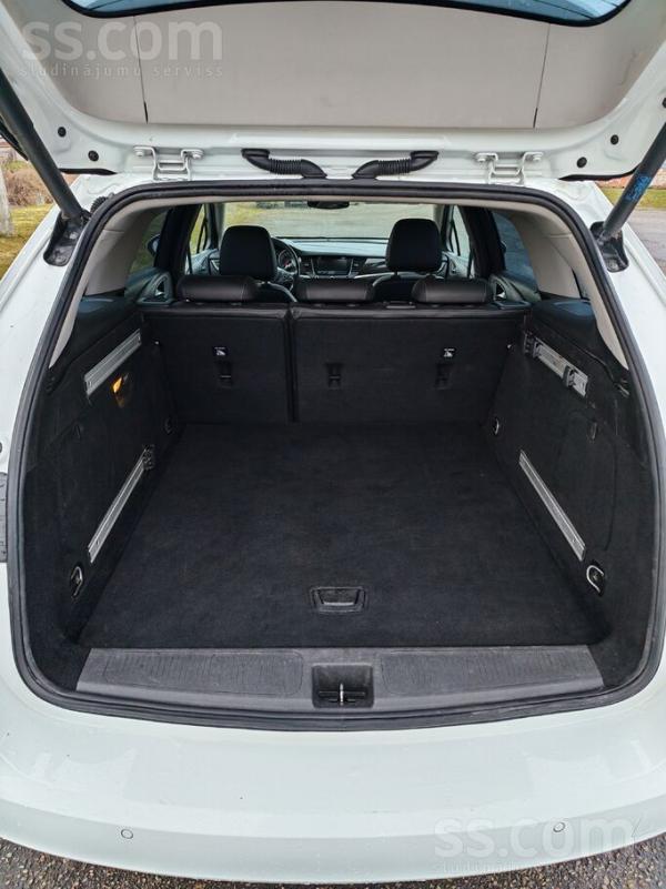 White Opel Astra 2016 in Riga, with an engine capacity of 1.60 L and mileage of 290 thousand km for 4950 €, photo 7 on AUTOMOTO.COM.LV