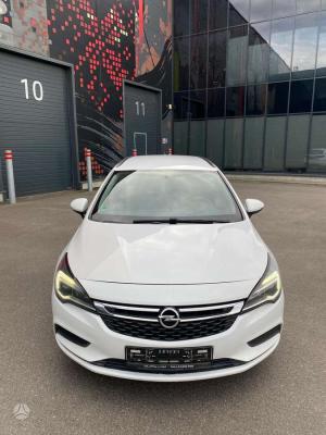 White Opel Astra 2016 in Kaunas, with an engine capacity of 1.60 L and mileage of 220 thousand km for 5499 €, photo 6 on AUTOMOTO.COM.LV