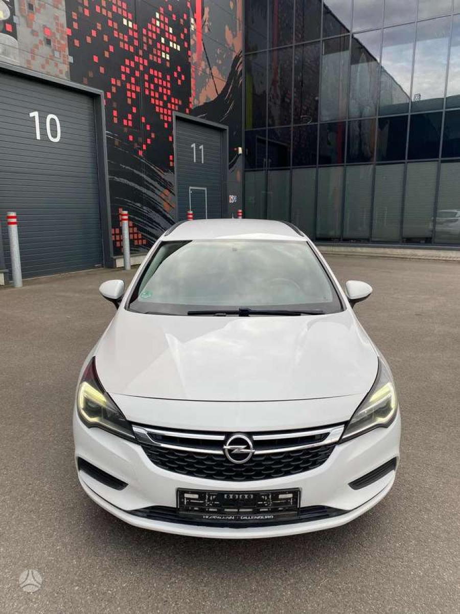 White Opel Astra 2016 in Kaunas, with an engine capacity of 1.60 L and mileage of 220 thousand km for 5499 €, photo 6 on AUTOMOTO.COM.LV