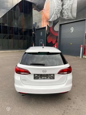 White Opel Astra 2016 in Kaunas, with an engine capacity of 1.60 L and mileage of 220 thousand km for 5499 €, photo 7 on AUTOMOTO.COM.LV