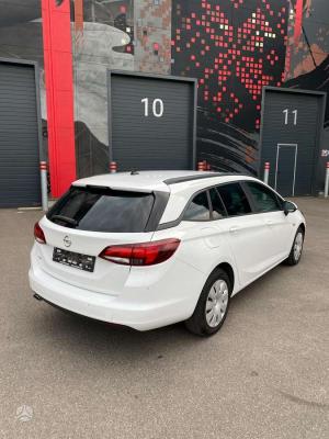 White Opel Astra 2016 in Kaunas, with an engine capacity of 1.60 L and mileage of 220 thousand km for 5499 €, photo 9 on AUTOMOTO.COM.LV