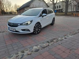 White Opel Astra 2017 in Vilnius, with an engine capacity of 1.60 L and mileage of 246 thousand km for 6900 €, photo  on AUTOMOTO.COM.LV
