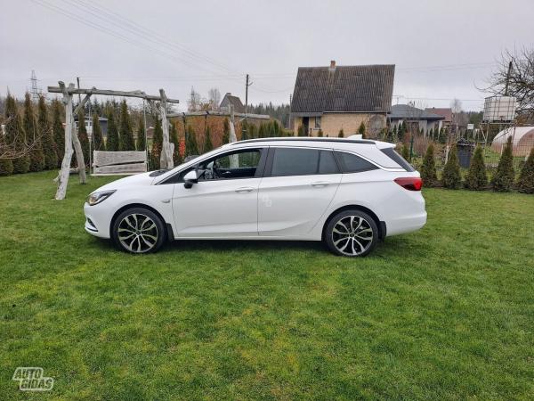 White Opel Astra 2017 in Vilnius, with an engine capacity of 1.60 L and mileage of 246 thousand km for 6750 €, photo 2 on AUTOMOTO.COM.LV
