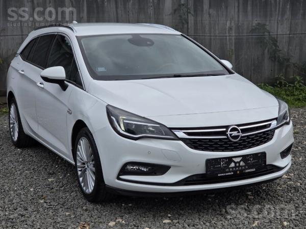 White Opel Astra 2017 in Riga, with an engine capacity of 1.60 L and mileage of 172 thousand km for 5790 €, photo 3 on AUTOMOTO.COM.LV