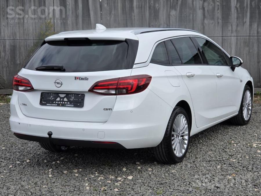 White Opel Astra 2017 in Riga, with an engine capacity of 1.60 L and mileage of 172 thousand km for 5790 €, photo 7 on AUTOMOTO.COM.LV