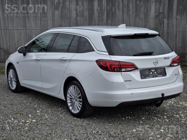 White Opel Astra 2017 in Riga, with an engine capacity of 1.60 L and mileage of 172 thousand km for 5790 €, photo 8 on AUTOMOTO.COM.LV