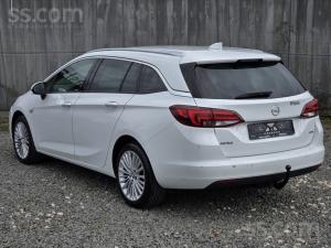White Opel Astra 2017 in Riga, with an engine capacity of 1.60 L and mileage of 172 thousand km for 5790 €, photo 8 on AUTOMOTO.COM.LV