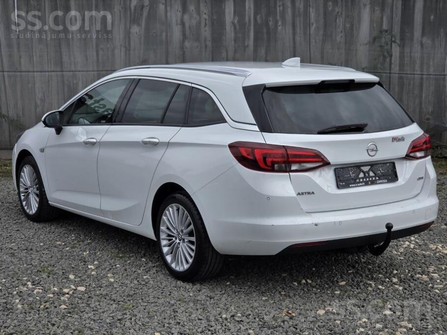 White Opel Astra 2017 in Riga, with an engine capacity of 1.60 L and mileage of 172 thousand km for 5790 €, photo 8 on AUTOMOTO.COM.LV
