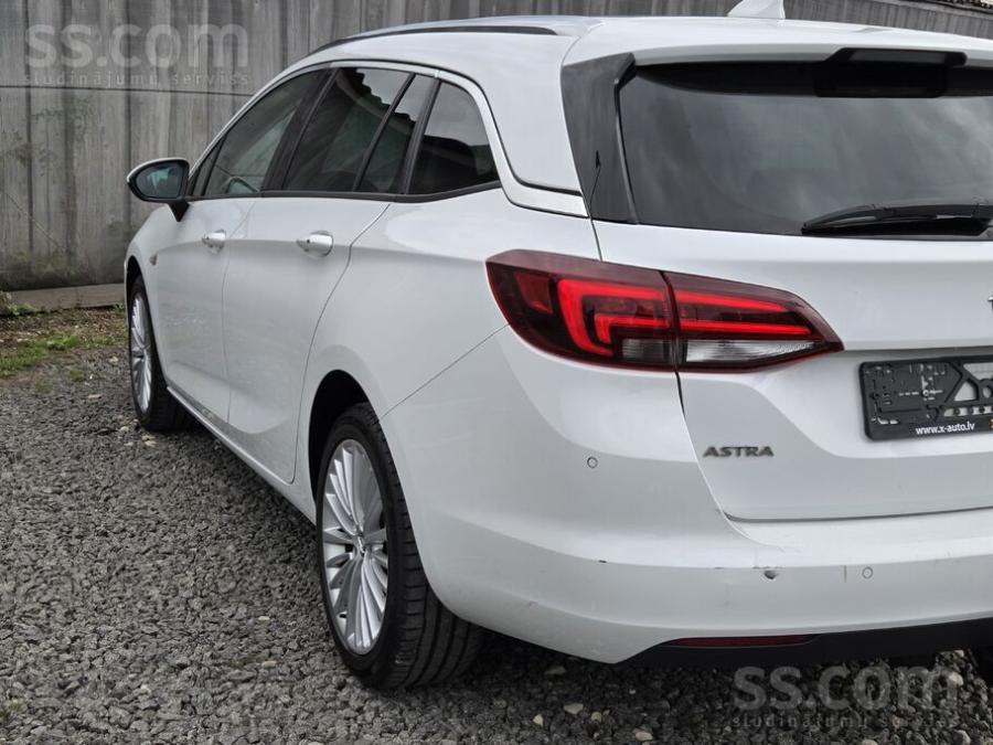 White Opel Astra 2017 in Riga, with an engine capacity of 1.60 L and mileage of 172 thousand km for 5790 €, photo 9 on AUTOMOTO.COM.LV