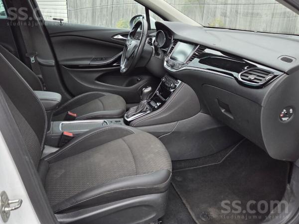 White Opel Astra 2017 in Riga, with an engine capacity of 1.60 L and mileage of 172 thousand km for 5790 €, photo 11 on AUTOMOTO.COM.LV
