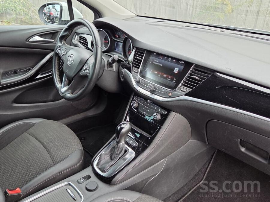 White Opel Astra 2017 in Riga, with an engine capacity of 1.60 L and mileage of 172 thousand km for 5790 €, photo 12 on AUTOMOTO.COM.LV