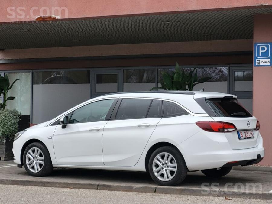 White Opel Astra 2018 in Jelgava, with an engine capacity of 1.60 L and mileage of 194 thousand km for 6590 €, photo 6 on AUTOMOTO.COM.LV