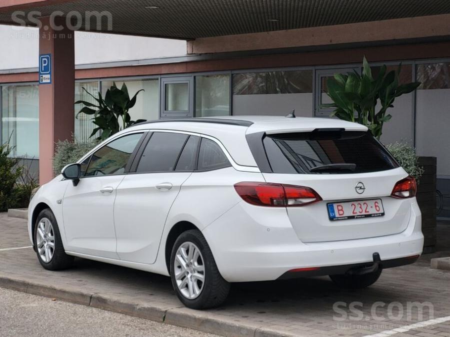 White Opel Astra 2018 in Jelgava, with an engine capacity of 1.60 L and mileage of 194 thousand km for 6590 €, photo 7 on AUTOMOTO.COM.LV