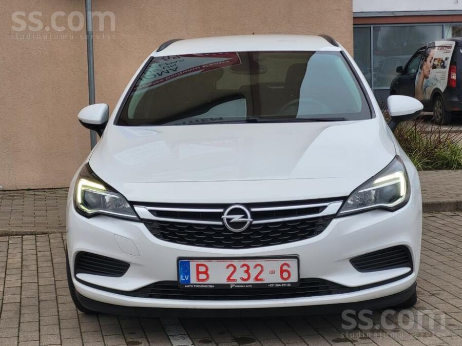 White Opel Astra 2018 in Jelgava, with an engine capacity of 1.60 L and mileage of 194 thousand km for 6590 €, photo 8 on AUTOMOTO.COM.LV