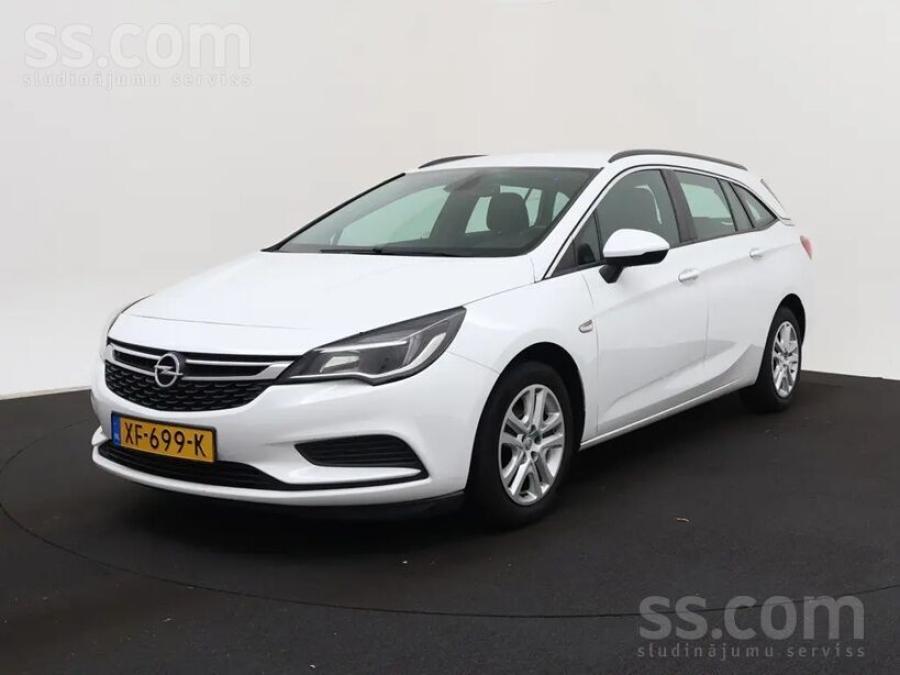 White Opel Astra 2018 in Jelgava, with an engine capacity of 1.60 L and mileage of 194 thousand km for 6590 €, photo 31 on AUTOMOTO.COM.LV