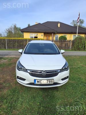 White Opel Astra 2018 in Riga, with an engine capacity of 1.60 L and mileage of 242 thousand km for 4999 €, photo  on AUTOMOTO.COM.LV