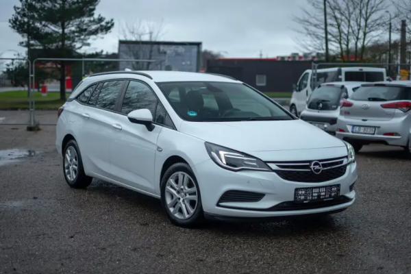 White Opel Astra 2018 in Liepaja, with an engine capacity of 1.60 L and mileage of 198 thousand km for 8850 €, photo 5 on AUTOMOTO.COM.LV