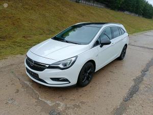 White Opel Astra 2018 in Vilnius, with an engine capacity of 1.60 L and mileage of 138 thousand km for 7490 €, photo  on AUTOMOTO.COM.LV