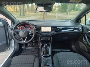 White Opel Astra 2018 in Riga, with an engine capacity of 1.60 L and mileage of 254 thousand km for 6600 €, photo 8 on AUTOMOTO.COM.LV