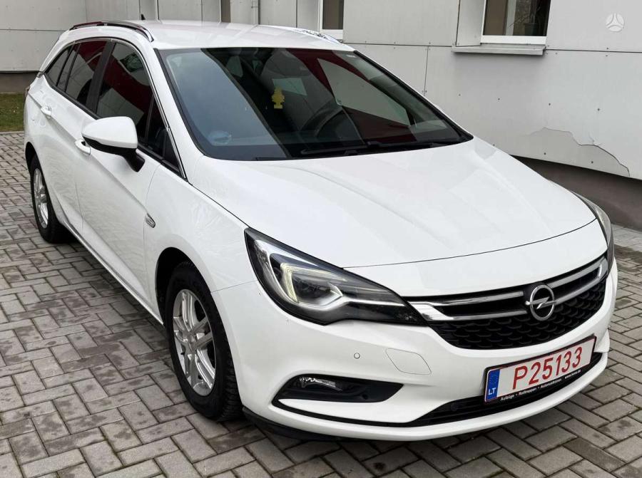 White Opel Astra 2019 in Kedainiai, with an engine capacity of 1.60 L and mileage of 167 thousand km for 6655 €, photo 1 on AUTOMOTO.COM.LV
