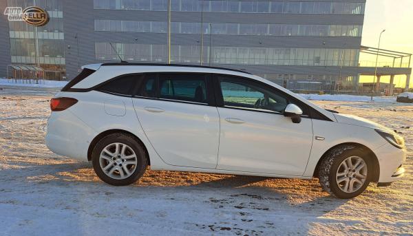 White Opel Astra 2019 in Kaunas, with an engine capacity of 1.60 L and mileage of 227 thousand km for 7500 €, photo 5 on AUTOMOTO.COM.LV