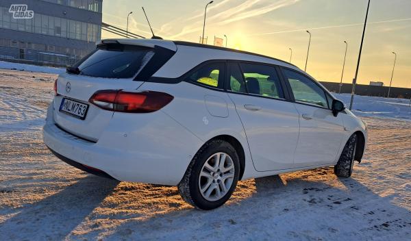 White Opel Astra 2019 in Kaunas, with an engine capacity of 1.60 L and mileage of 227 thousand km for 7500 €, photo 6 on AUTOMOTO.COM.LV