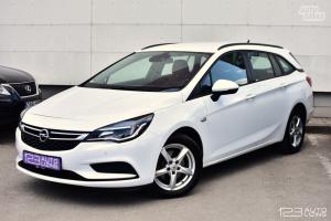 White Opel Astra 2019 in Kretinga, with an engine capacity of 1.60 L and mileage of 179 thousand km for 7399 €, photo  on AUTOMOTO.COM.LV