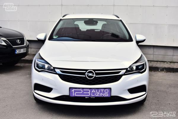White Opel Astra 2019 in Kretinga, with an engine capacity of 1.60 L and mileage of 179 thousand km for 7399 €, photo 3 on AUTOMOTO.COM.LV