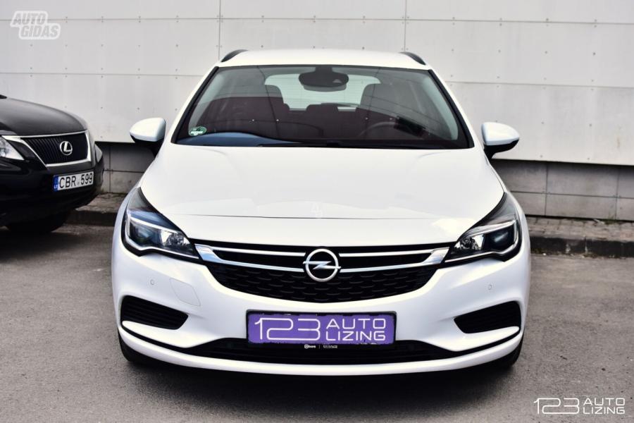 White Opel Astra 2019 in Kretinga, with an engine capacity of 1.60 L and mileage of 179 thousand km for 7399 €, photo 4 on AUTOMOTO.COM.LV