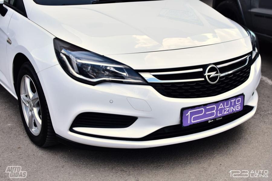White Opel Astra 2019 in Kretinga, with an engine capacity of 1.60 L and mileage of 179 thousand km for 7399 €, photo 7 on AUTOMOTO.COM.LV