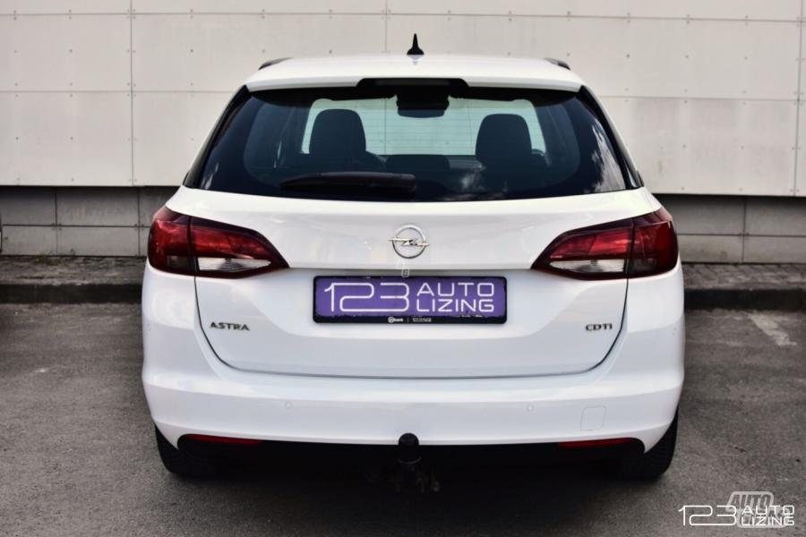 White Opel Astra 2019 in Kretinga, with an engine capacity of 1.60 L and mileage of 179 thousand km for 7399 €, photo 10 on AUTOMOTO.COM.LV