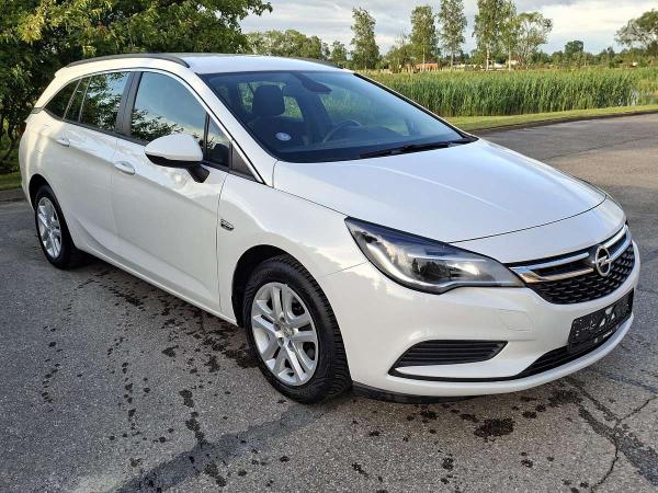 White Opel Astra 2019 in Ukmerge, with an engine capacity of 1.00 L and mileage of 154 thousand km for 5950 €, photo 2 on AUTOMOTO.COM.LV