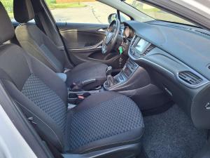 White Opel Astra 2019 in Ukmerge, with an engine capacity of 1.00 L and mileage of 154 thousand km for 5950 €, photo 12 on AUTOMOTO.COM.LV