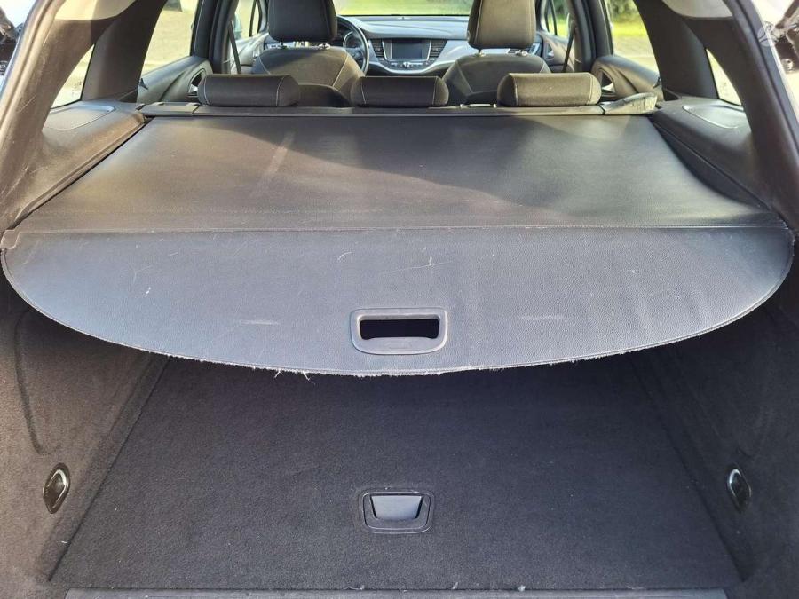 White Opel Astra 2019 in Ukmerge, with an engine capacity of 1.00 L and mileage of 154 thousand km for 5950 €, photo 14 on AUTOMOTO.COM.LV