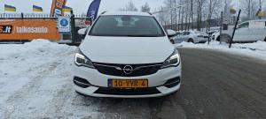White Opel Astra 2020 in Kaunas, with an engine capacity of 1.20 L and mileage of 164 thousand km for 5450 €, photo 2 on AUTOMOTO.COM.LV