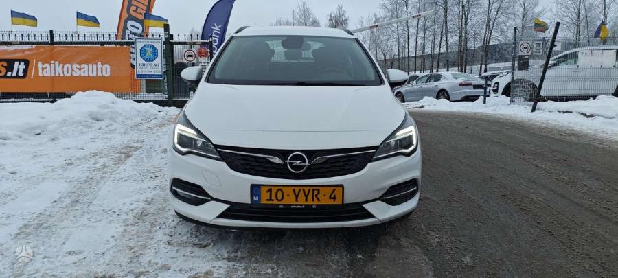 White Opel Astra 2020 in Kaunas, with an engine capacity of 1.20 L and mileage of 164 thousand km for 5450 €, photo 2 on AUTOMOTO.COM.LV