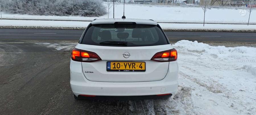White Opel Astra 2020 in Kaunas, with an engine capacity of 1.20 L and mileage of 164 thousand km for 5450 €, photo 5 on AUTOMOTO.COM.LV