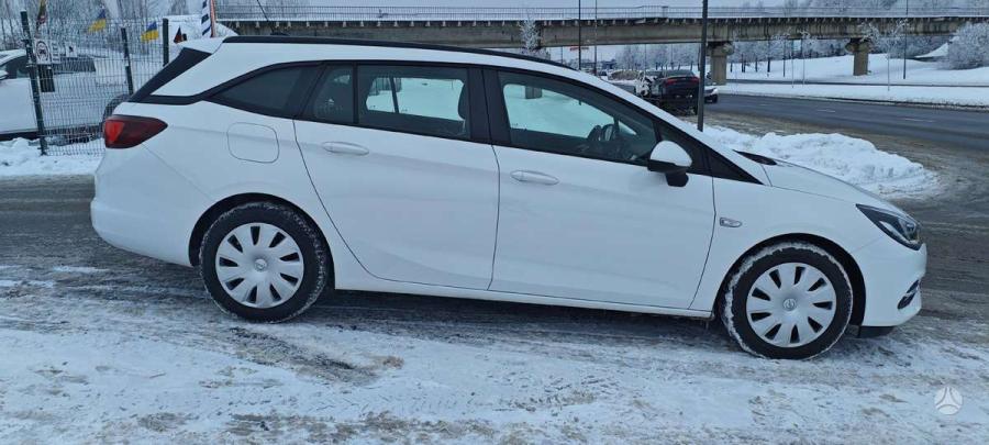 White Opel Astra 2020 in Kaunas, with an engine capacity of 1.20 L and mileage of 164 thousand km for 5450 €, photo 6 on AUTOMOTO.COM.LV