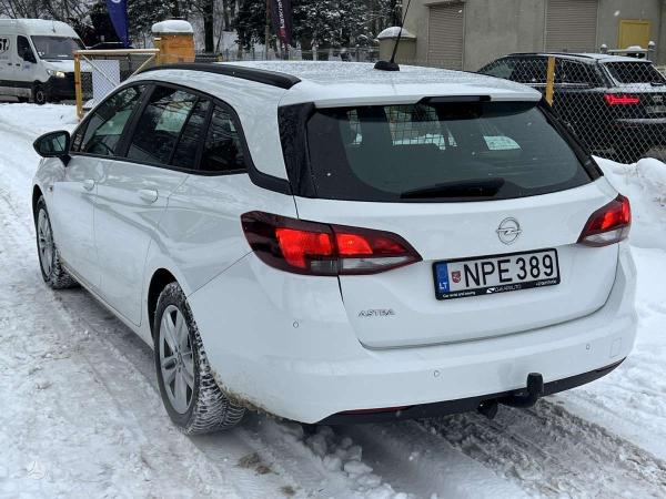 White Opel Astra 2021 in Vilnius, with an engine capacity of 1.50 L and mileage of 117 thousand km for 10000 €, photo 3 on AUTOMOTO.COM.LV