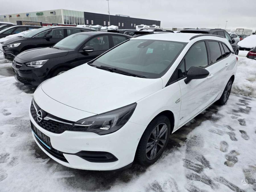 White Opel Astra 2021 in Vilnius, with an engine capacity of 1.20 L and mileage of 164 thousand km for 7900 €, photo 2 on AUTOMOTO.COM.LV