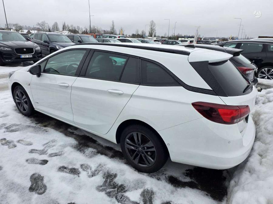 White Opel Astra 2021 in Vilnius, with an engine capacity of 1.20 L and mileage of 164 thousand km for 7900 €, photo 4 on AUTOMOTO.COM.LV