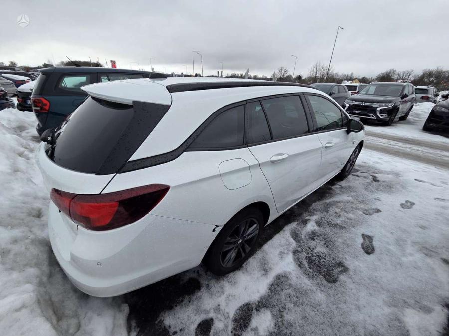 White Opel Astra 2021 in Vilnius, with an engine capacity of 1.20 L and mileage of 164 thousand km for 7900 €, photo 6 on AUTOMOTO.COM.LV
