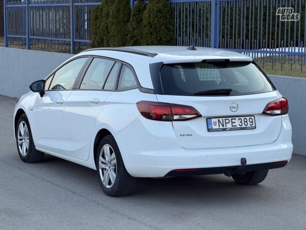 White Opel Astra 2021 in Vilnius, with an engine capacity of 1.50 L and mileage of 117 thousand km for 9000 €, photo 3 on AUTOMOTO.COM.LV