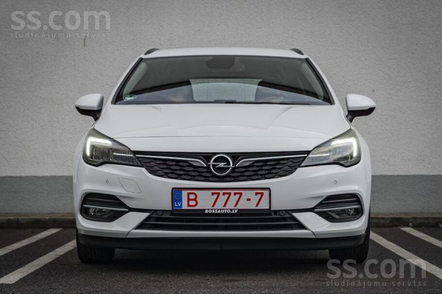 White Opel Astra 2021 in Riga, with an engine capacity of 1.50 L and mileage of 151 thousand km for 9450 €, photo 3 on AUTOMOTO.COM.LV