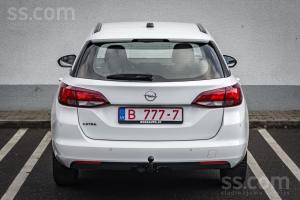 White Opel Astra 2021 in Riga, with an engine capacity of 1.50 L and mileage of 151 thousand km for 9450 €, photo 6 on AUTOMOTO.COM.LV