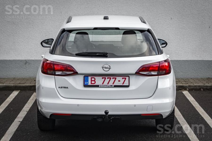 White Opel Astra 2021 in Riga, with an engine capacity of 1.50 L and mileage of 151 thousand km for 9450 €, photo 6 on AUTOMOTO.COM.LV