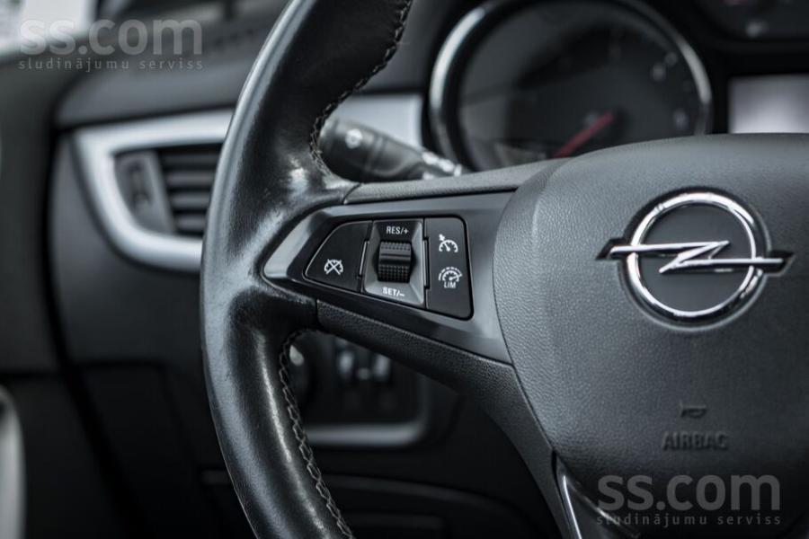 White Opel Astra 2021 in Riga, with an engine capacity of 1.50 L and mileage of 151 thousand km for 9450 €, photo 16 on AUTOMOTO.COM.LV